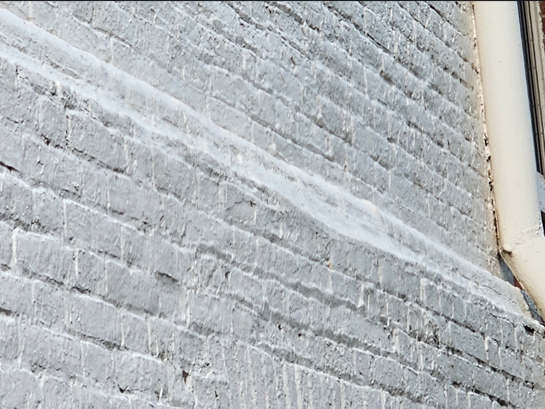 Taper in a Masonry Wall - Dupont Tuckpointing